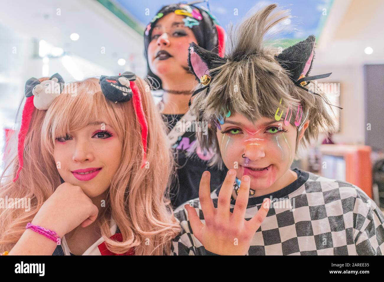 Three generation Z teenage girls made up strangely Stock Photo - Alamy