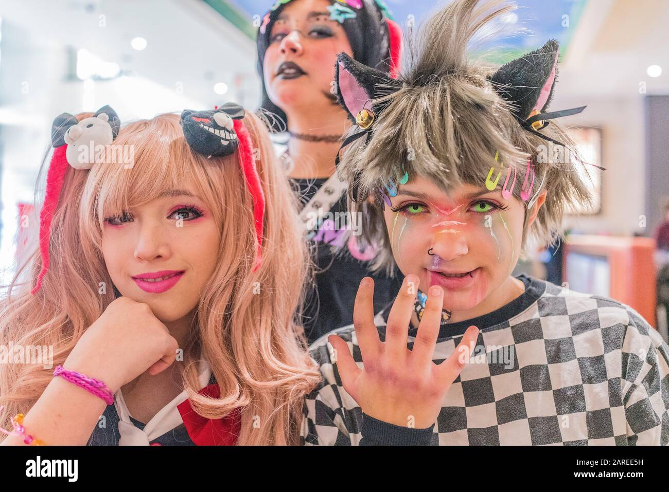 Three generation Z teenage girls made up strangely Stock Photo - Alamy