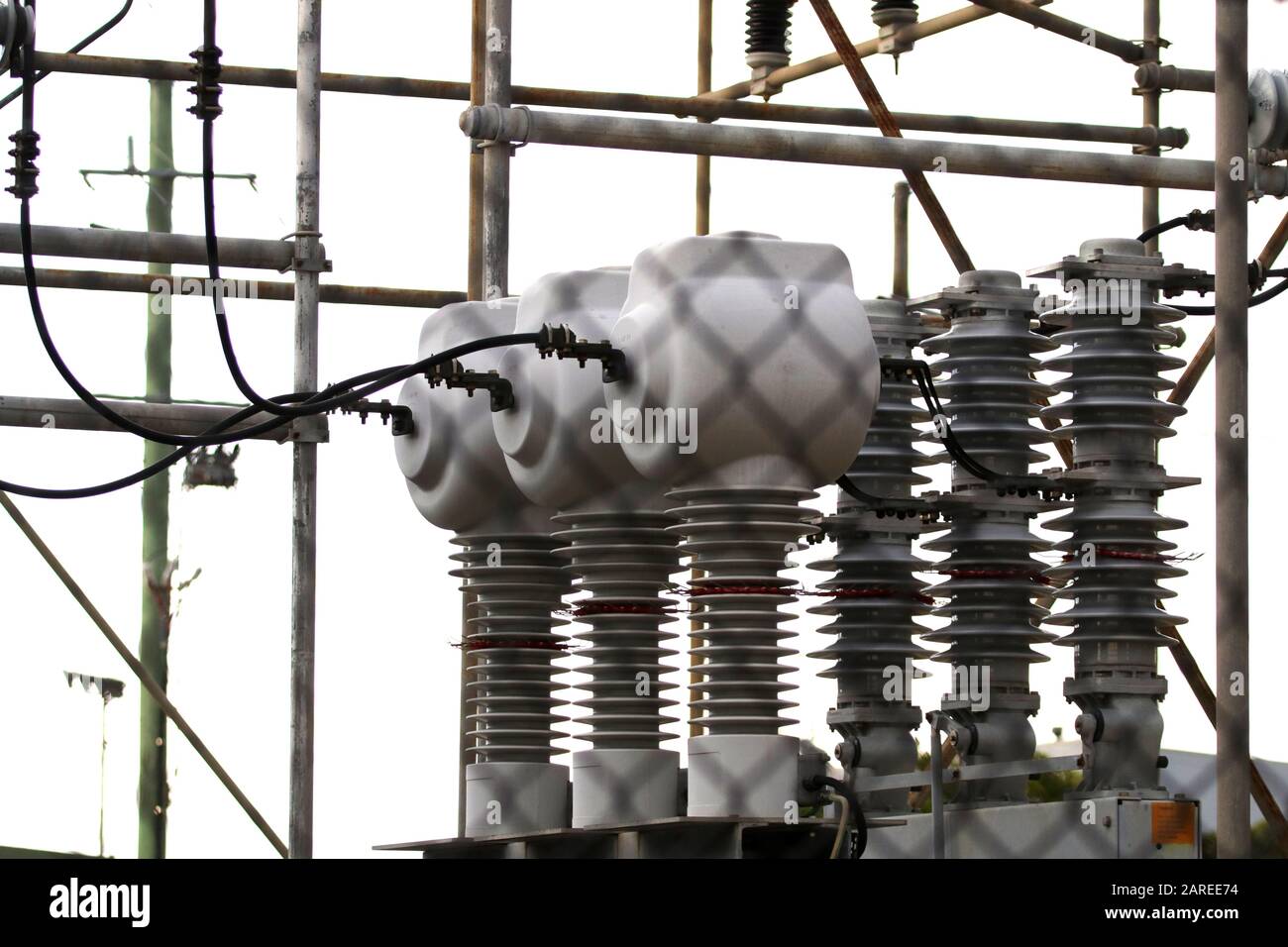 Electrical substation: Transformers, wires, cables and structural posts ...