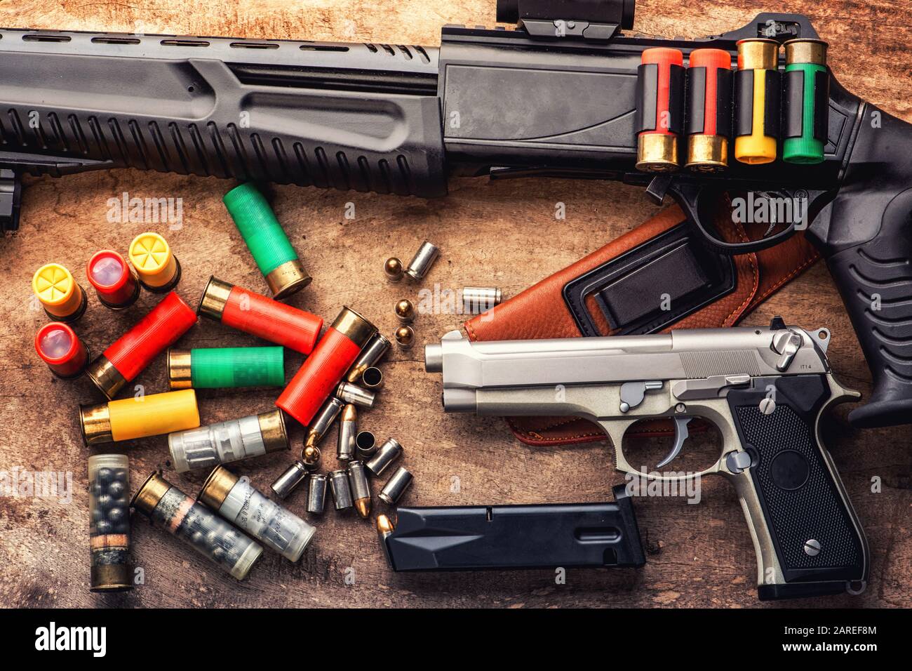 Weapons and military equipment. 9 mm pistol gun bullets and 12 gauge ...