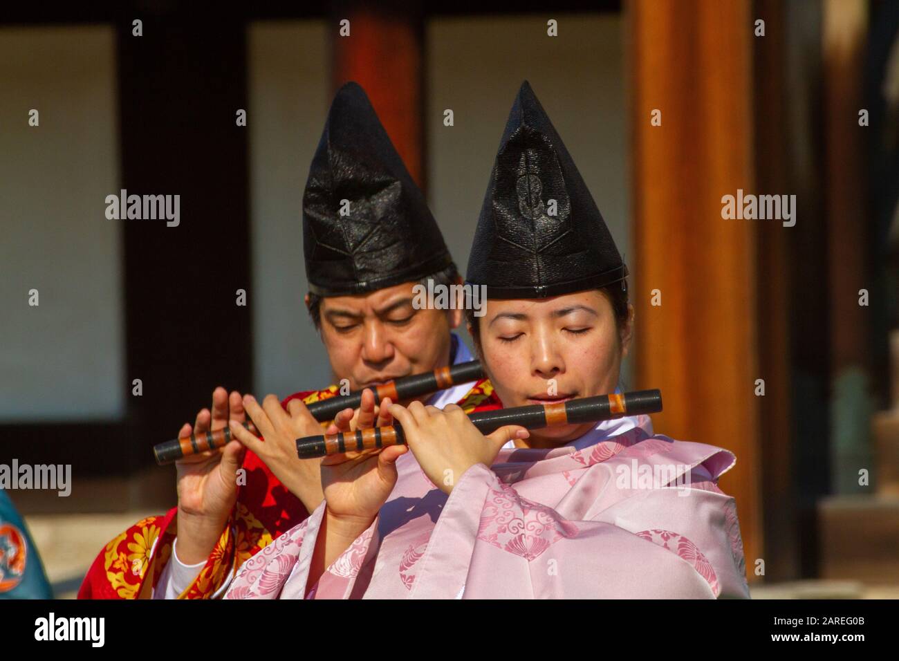Japan, Kyoto, Flute players in the Imperial Palace, Ceremony held with ...