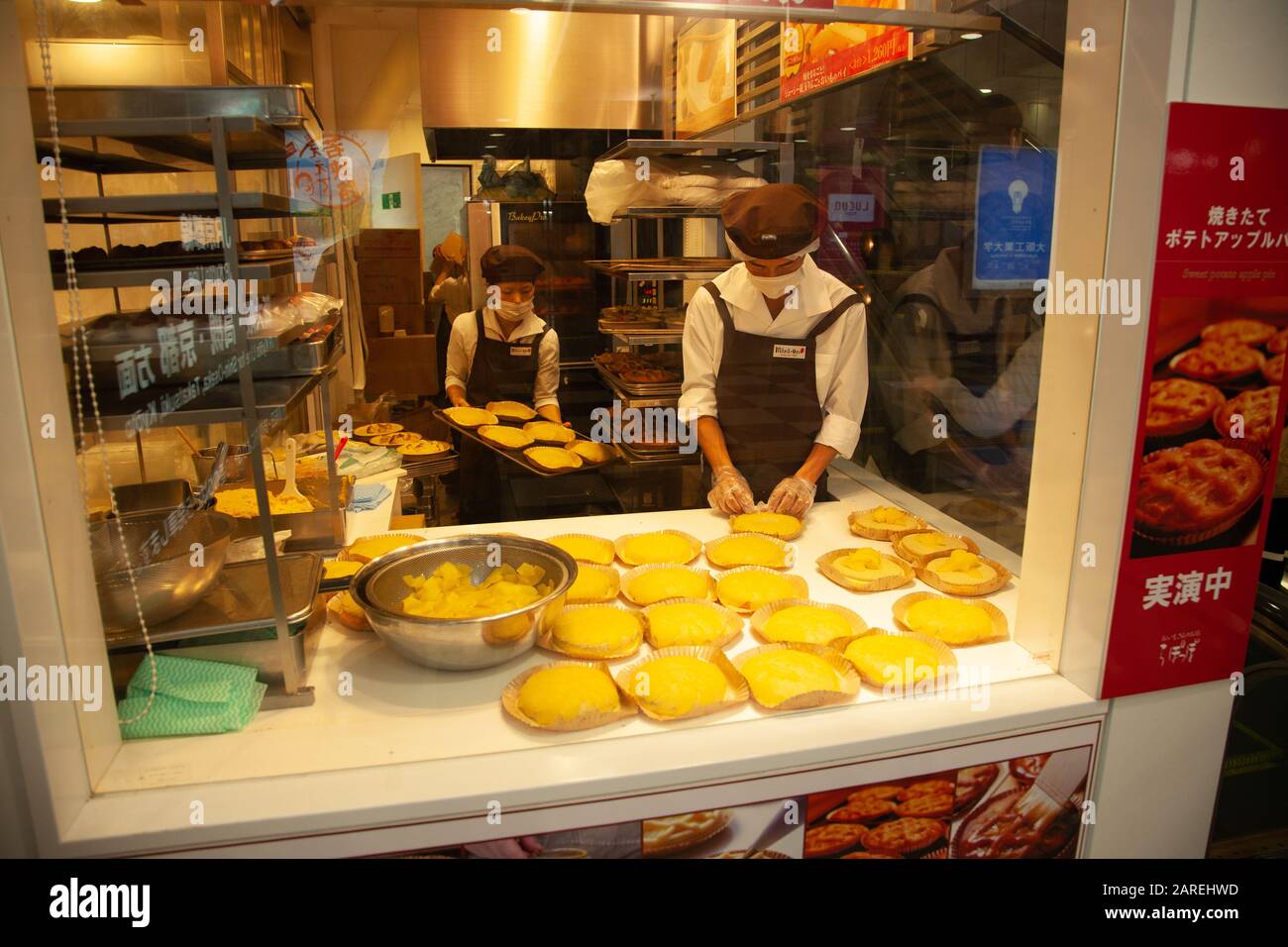 Food stall at the train station Stock Photo - Alamy