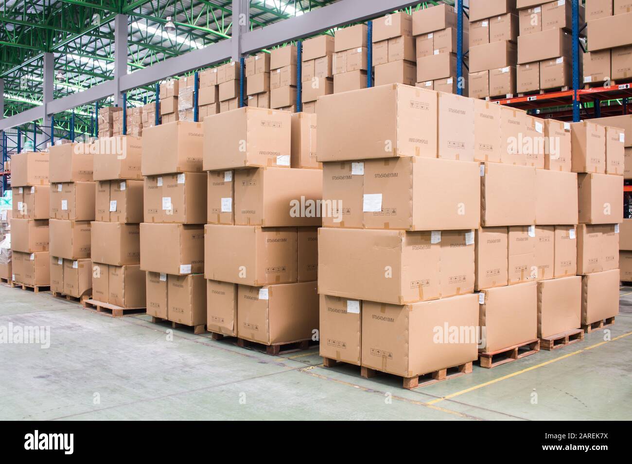 Rows of material boxes or product boxes in warehouse area Stock Photo ...