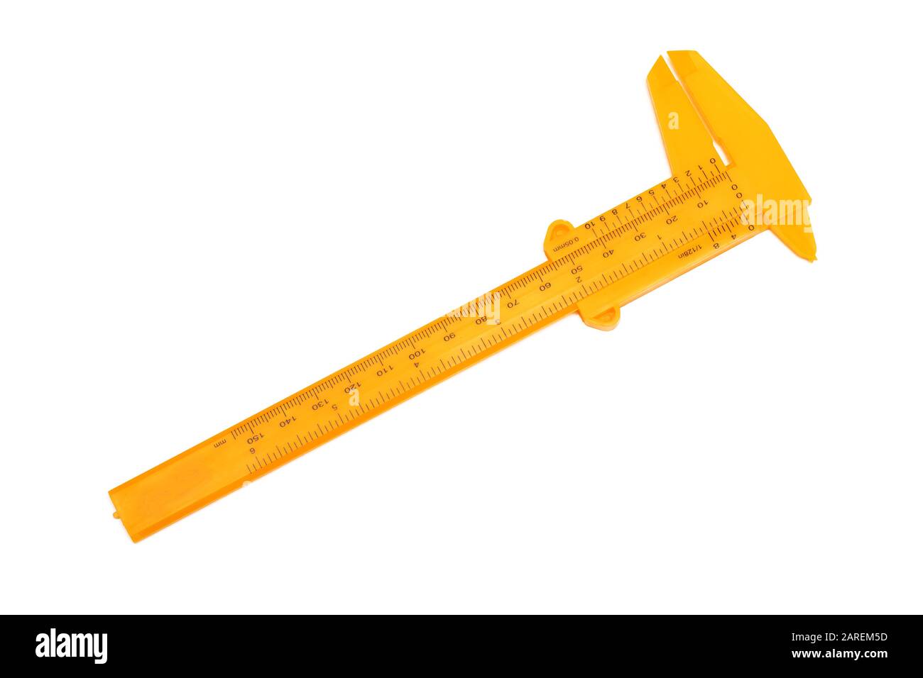 Yellow plastic calliper close up isolated on white background Stock ...