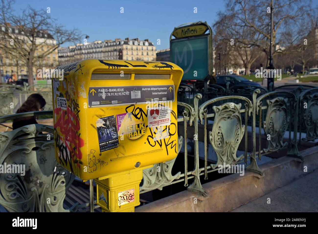 Paris post boxes covered in graffiti tags and stickers advertising ...