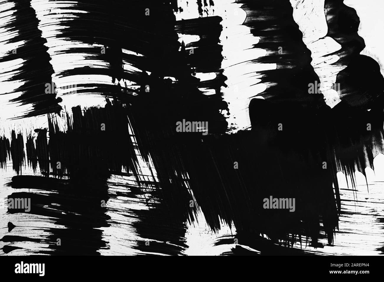 Patterns of black paint from a brush on a white background. horizontal ...
