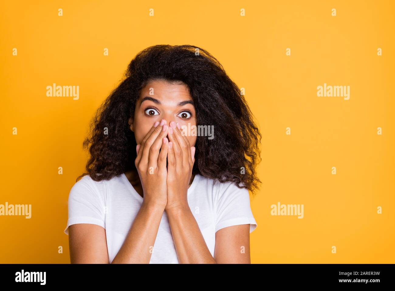 Photo of horrified feared girl in panic negative emotions covering her ...