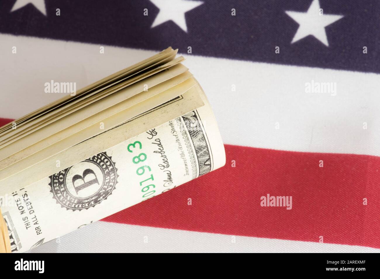 Dollar banknotes and flag of USA Stock Photo - Alamy