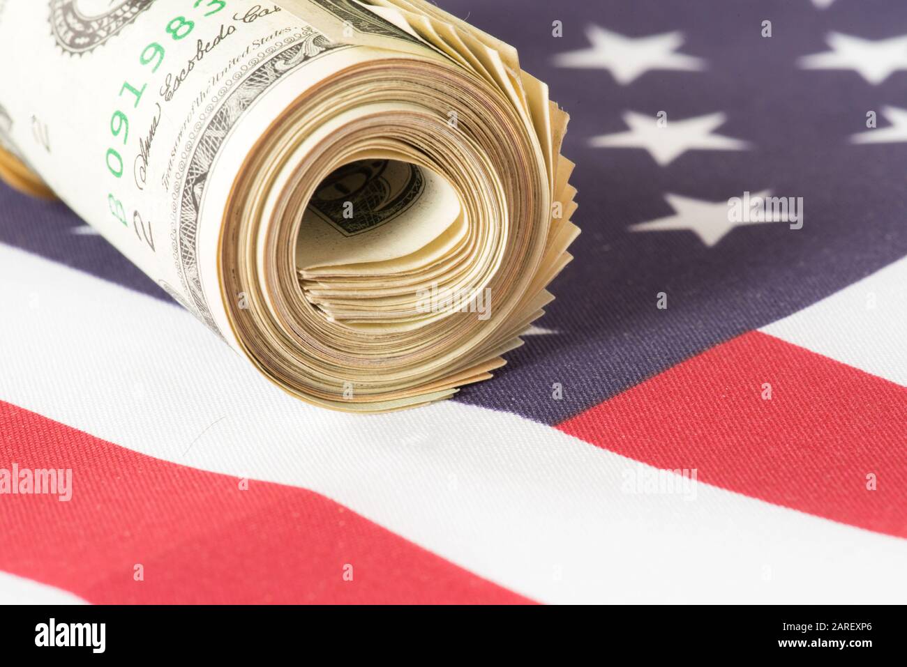 Dollar banknotes and flag of USA Stock Photo - Alamy