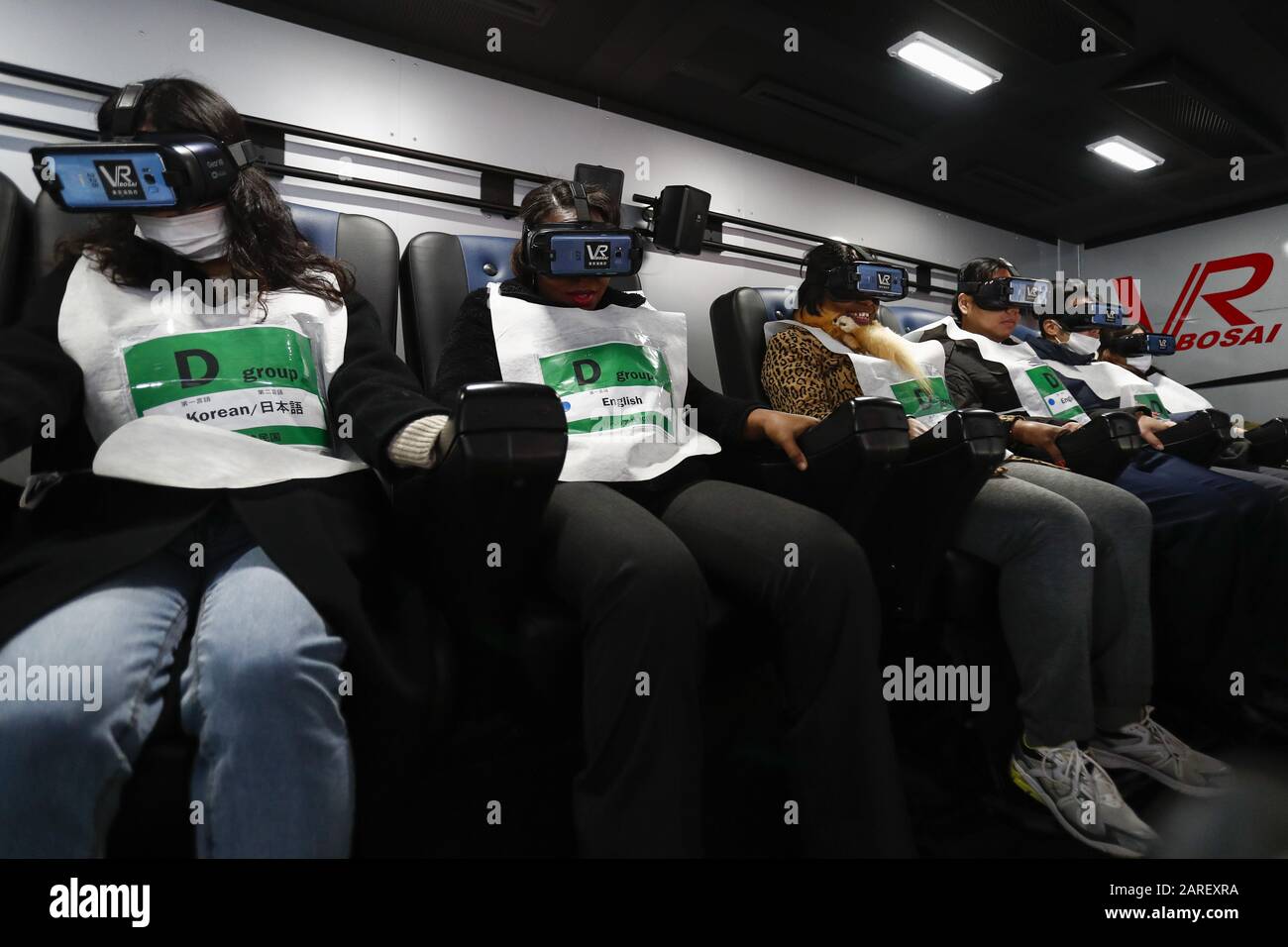 Tokyo, Japan. 28th Jan, 2020. Foreign residents wearing VR glasses try ...