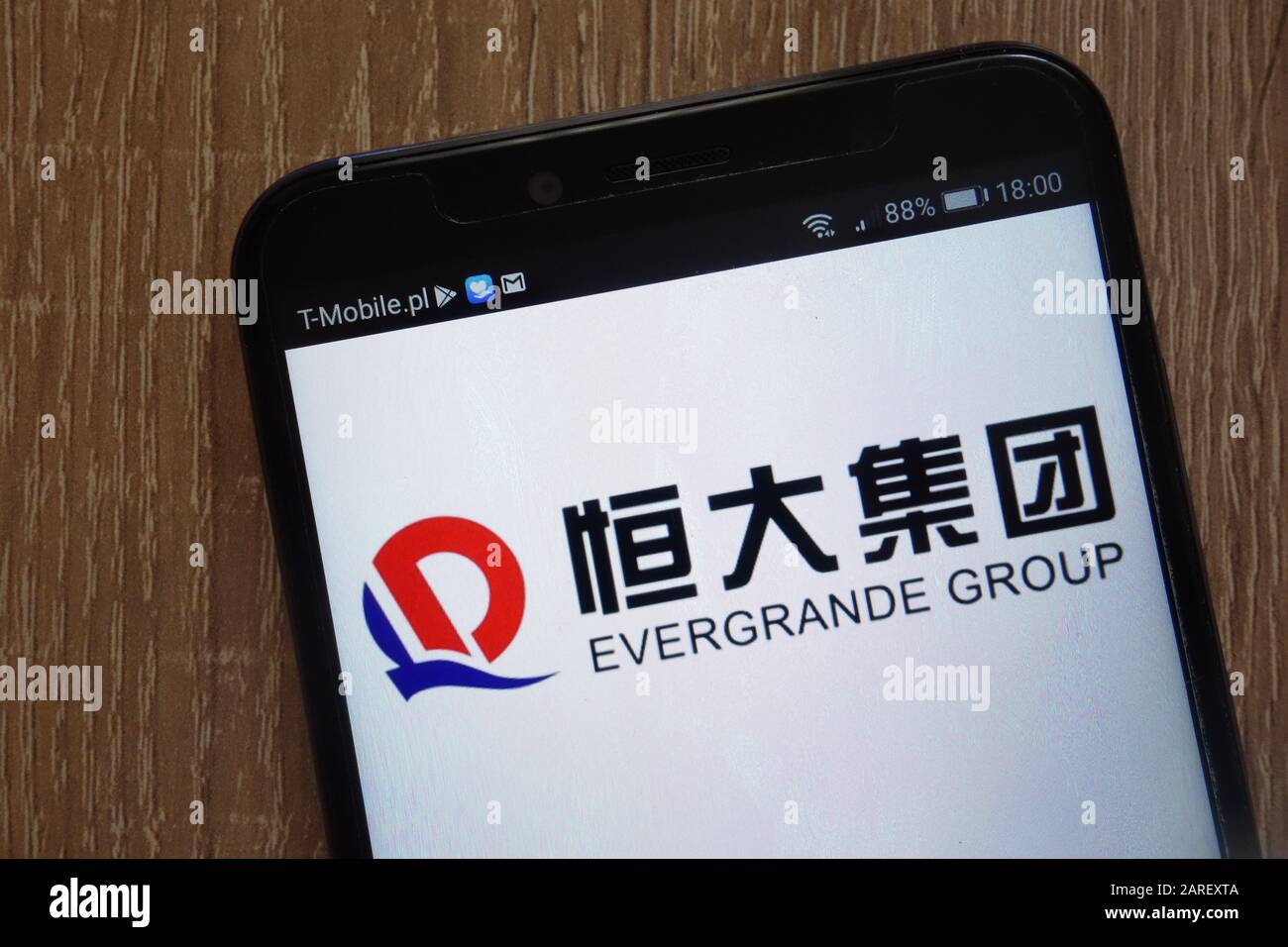 Evergrande Group logo displayed on a modern smartphone Stock Photo - Alamy