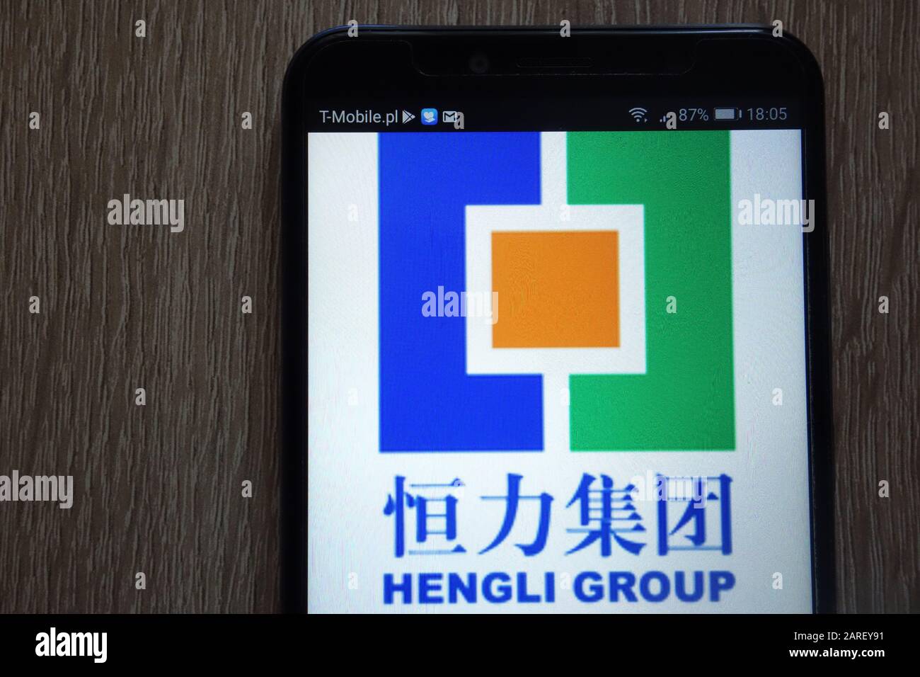 Hengli Group logo displayed on a modern smartphone Stock Photo - Alamy