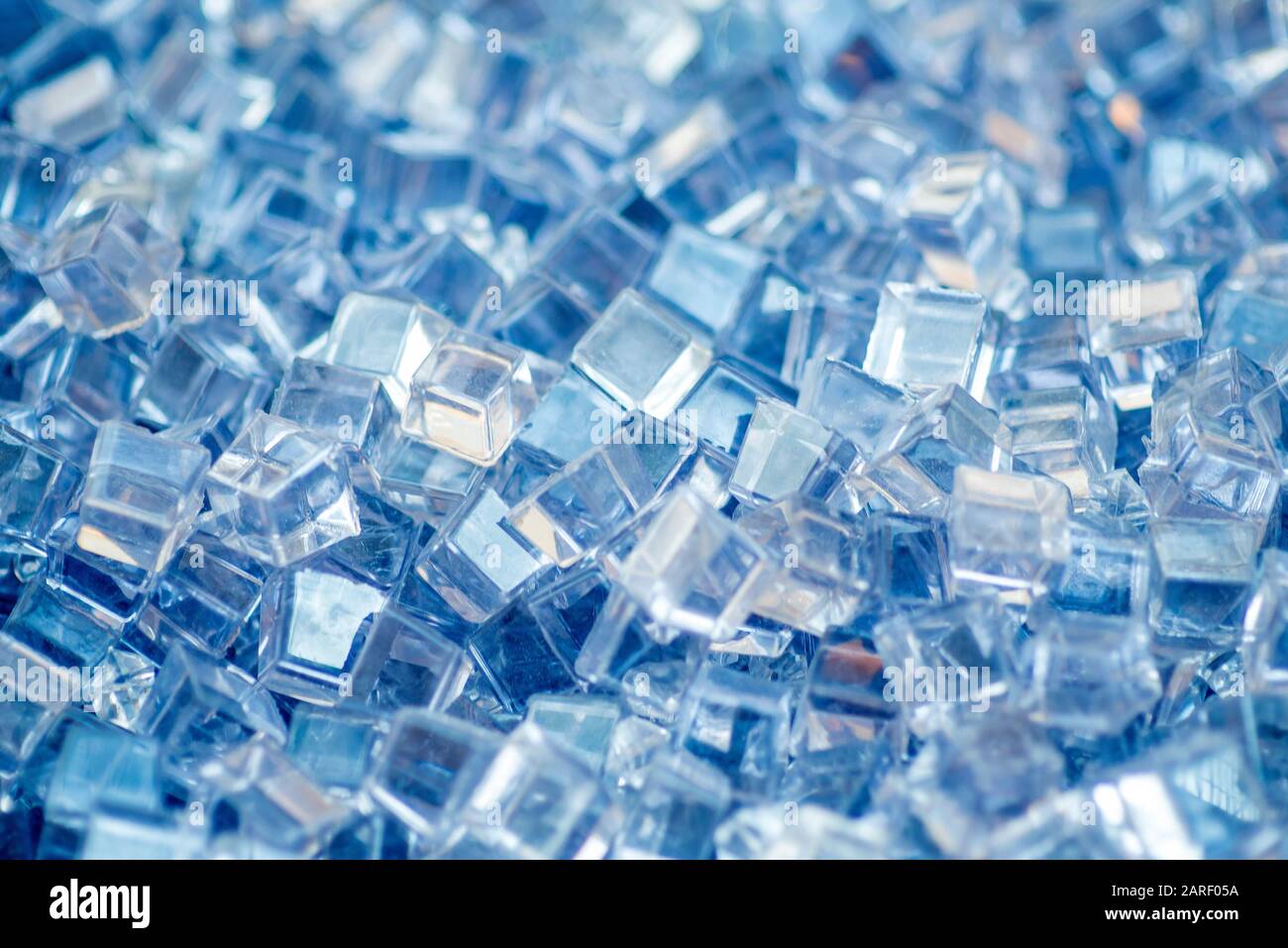 Blue and shiny ice cubes, cold background Stock Photo - Alamy