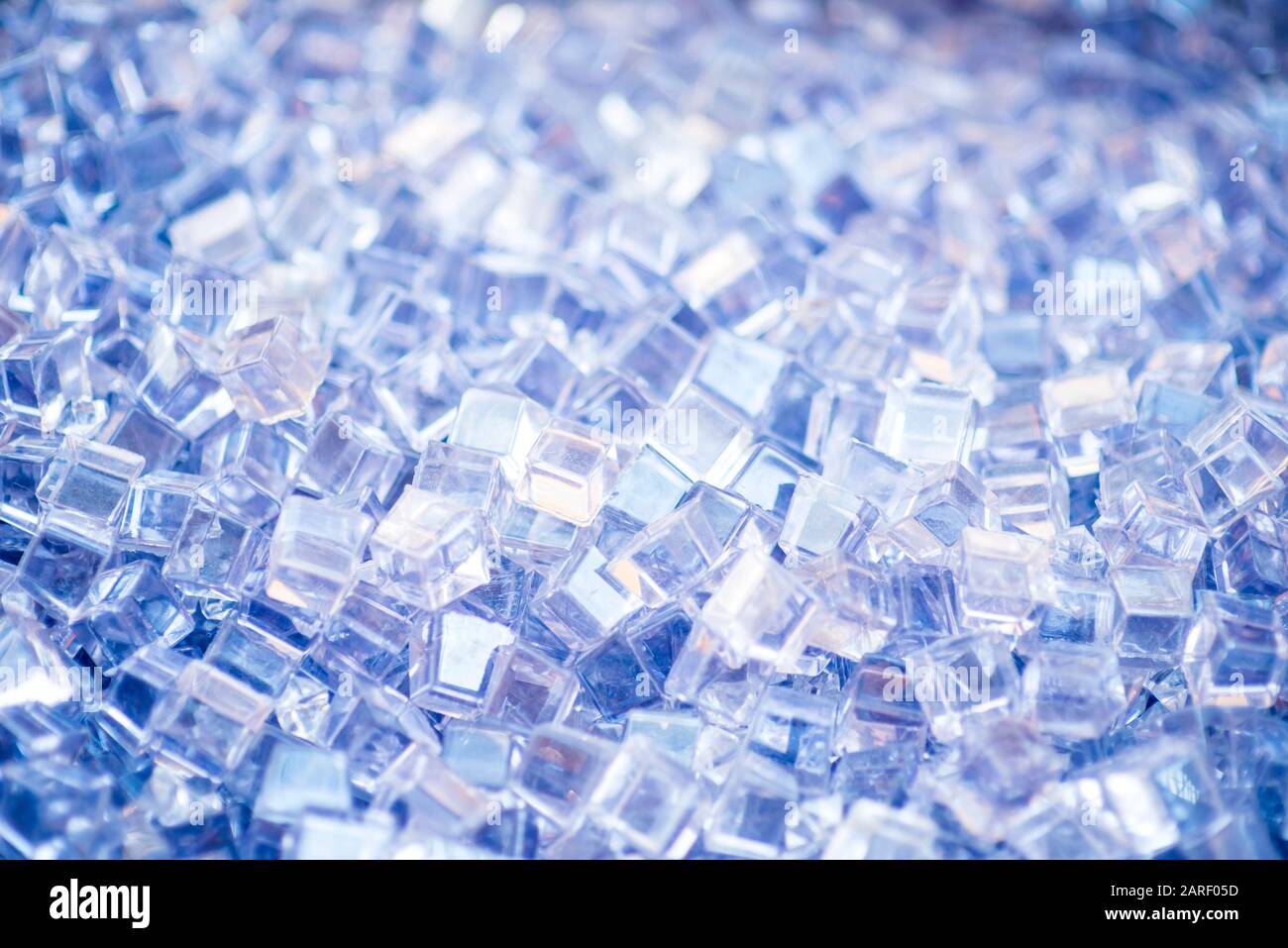 Blue and shiny ice cubes, cold background Stock Photo - Alamy