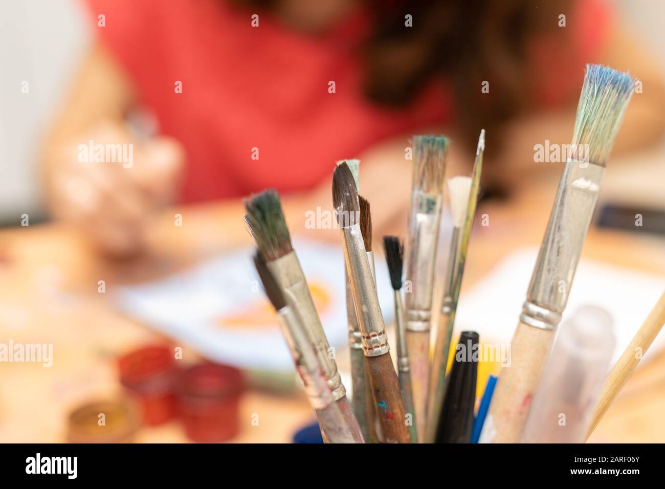 Child paintbrushes class hi-res stock photography and images - Alamy