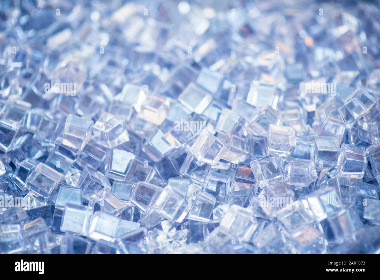 Blue and shiny ice cubes, cold background Stock Photo - Alamy