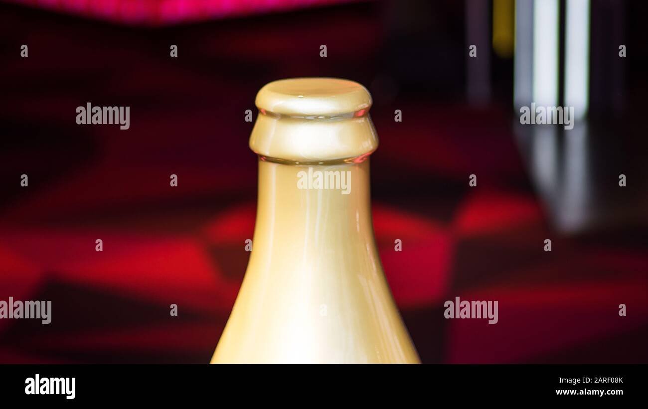 Golden Bottleneck of a champagne. Bottle on gradient grey background ...