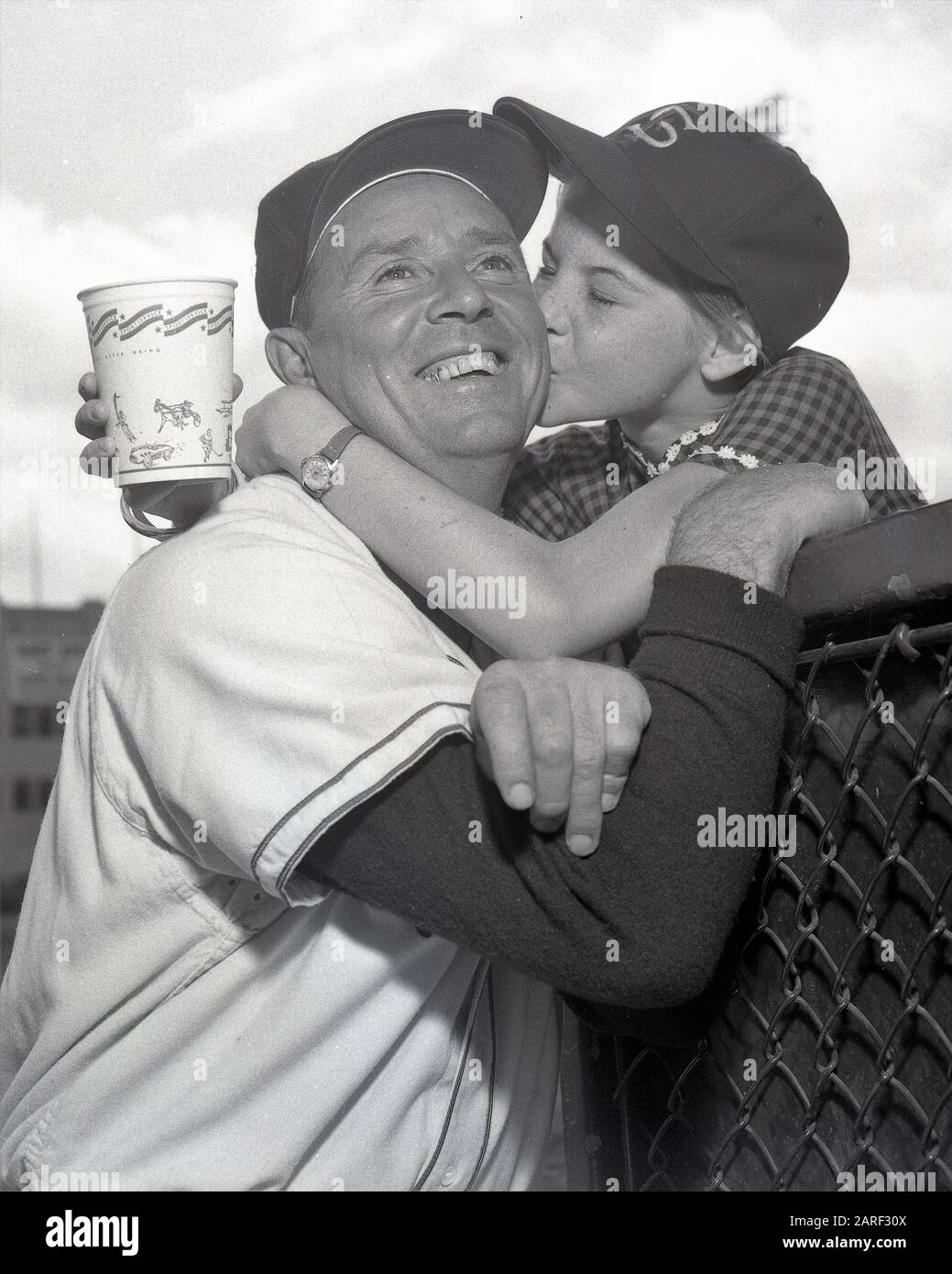 Joe Gordon received a kiss from a San Francisco Seals fan after winning ...