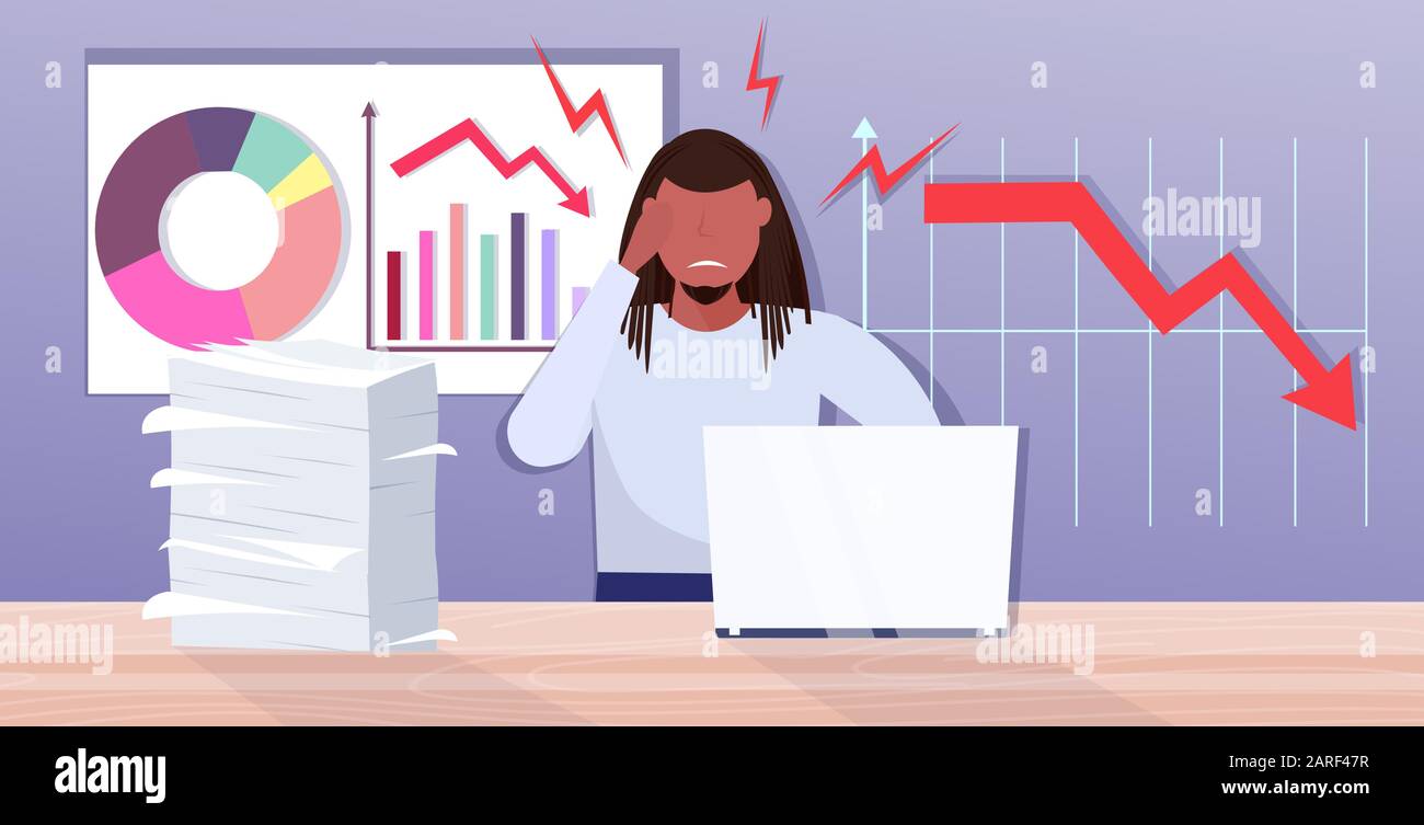 overworked businessman using laptop analyzing downward graph chart ...