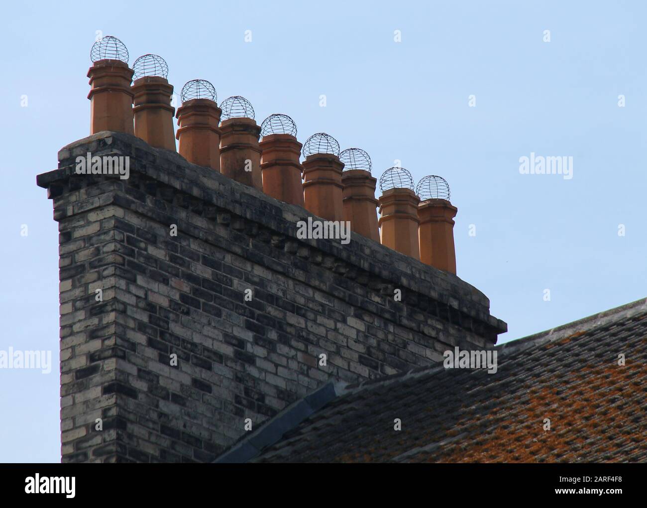 Terracotta chimney pots hi-res stock photography and images - Alamy