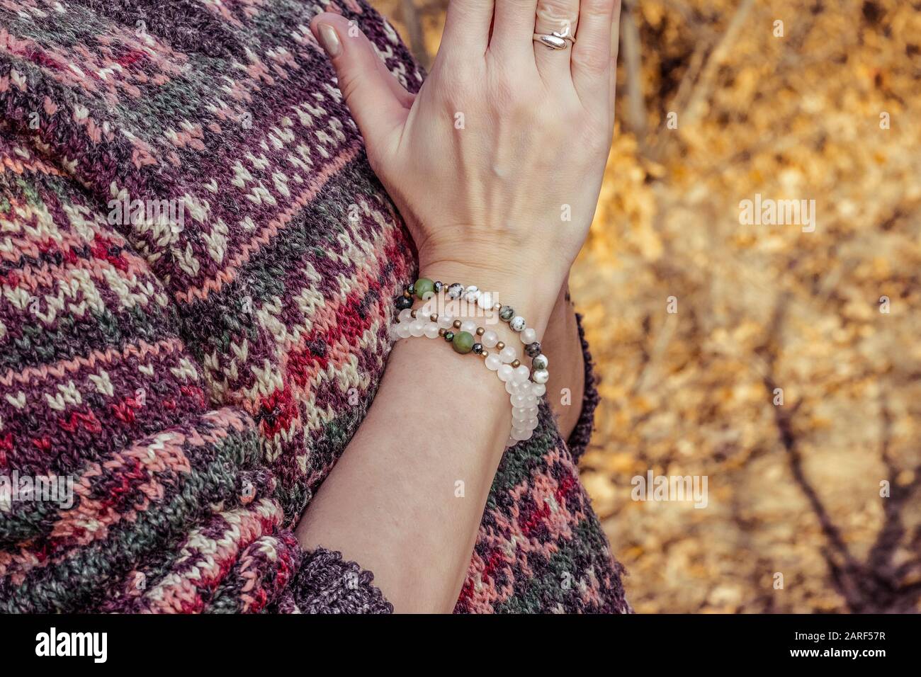Detal of woman doing namaste hand mudra pose in the forest Stock Photo ...
