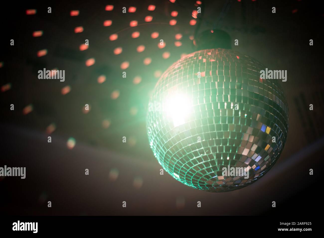 Color image of a shiny disco ball in a night club Stock Photo - Alamy