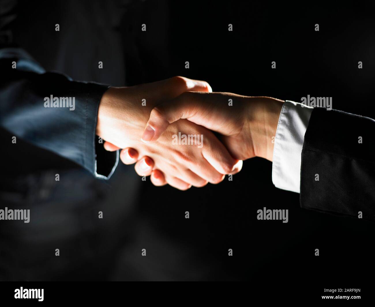 Handshake business black hi-res stock photography and images - Alamy