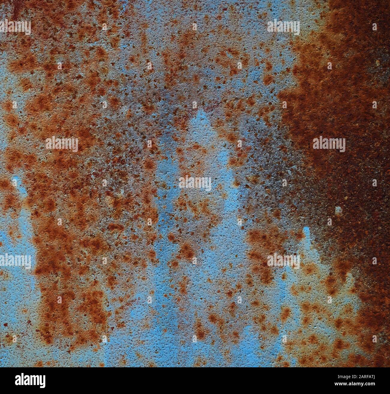 brown iron texture of rusty sheet with remains of blue paint. Metal ...