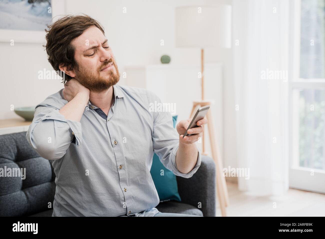 Stiff neck hi-res stock photography and images - Alamy