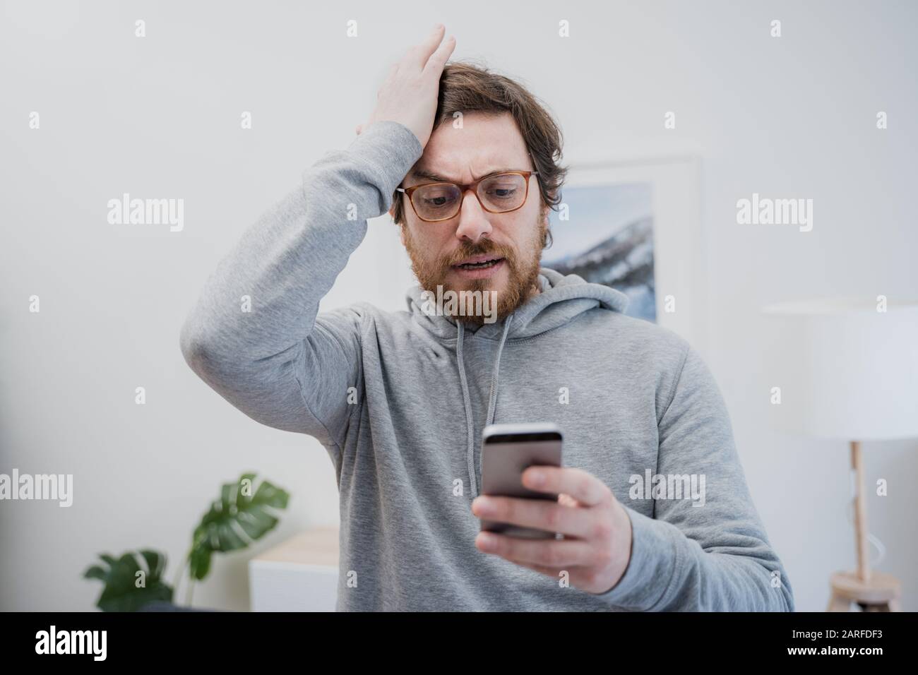 Angry guy on phone hi-res stock photography and images - Alamy
