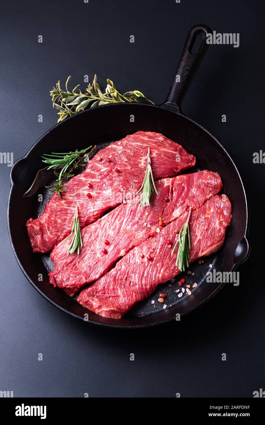 Food concept organic raw meat filet beef steak in skillet iron pan on ...