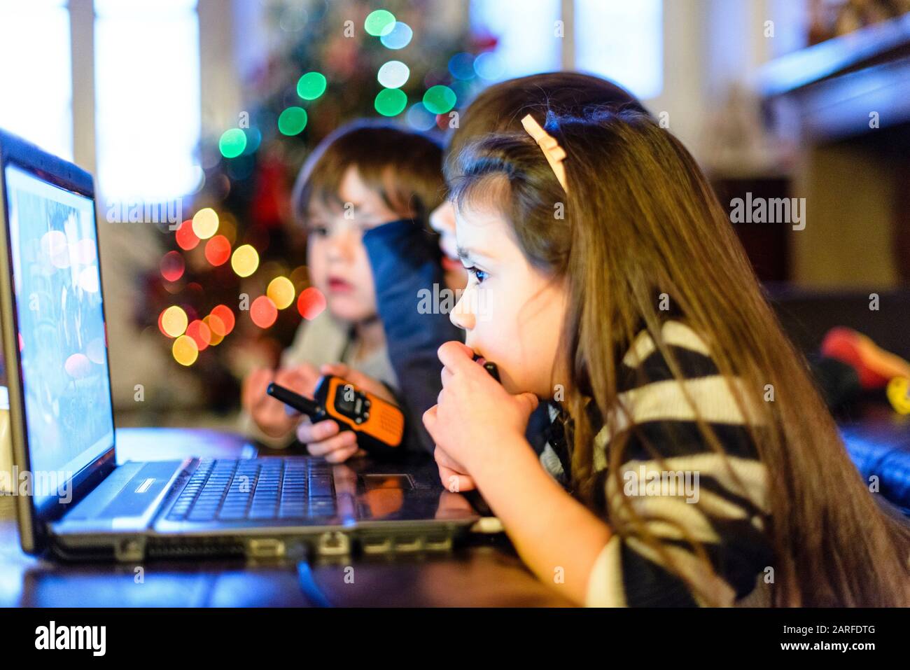 Brother sister watching film on hi-res stock photography and images - Alamy