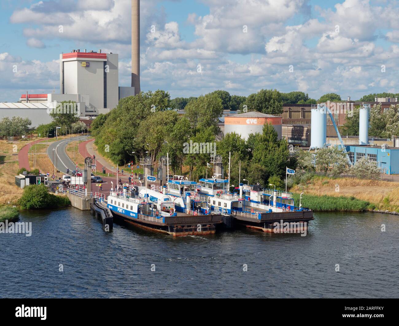 Two small Car and Passenger Ferries at a canal Crossing point on the ...