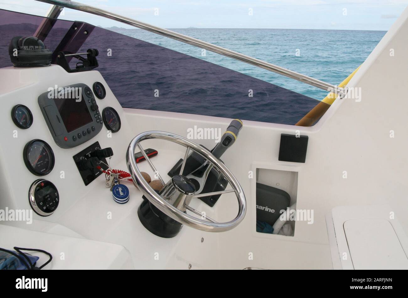 Cockpit in front of touring speedboat, Seychelles Stock Photo - Alamy