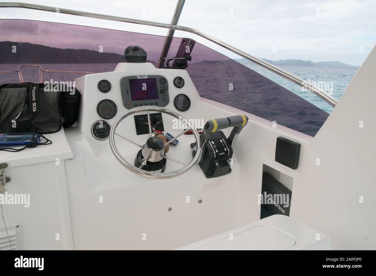 Cockpit in front of touring speedboat, Seychelles Stock Photo - Alamy