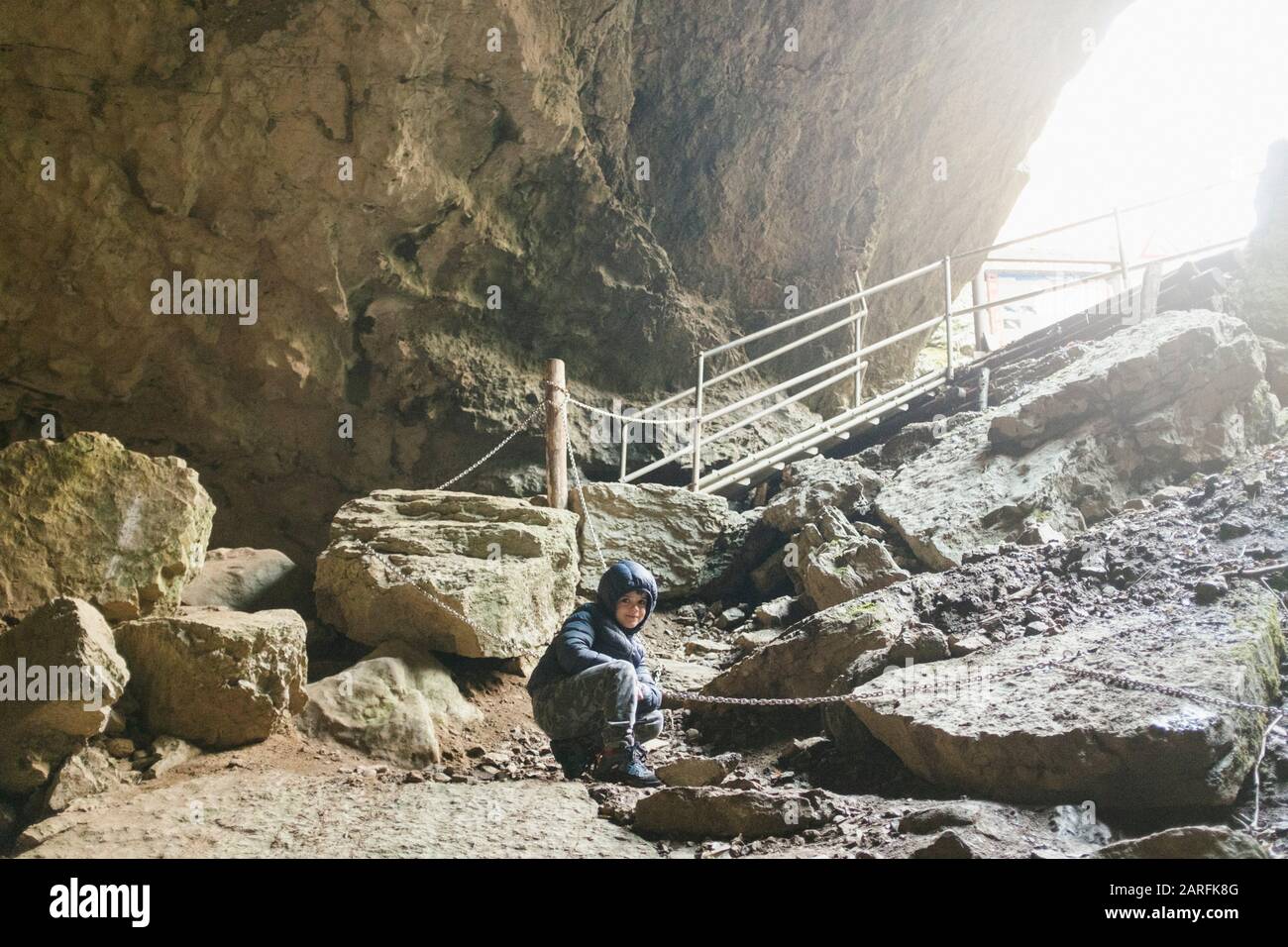 Children explore cave hi-res stock photography and images - Alamy