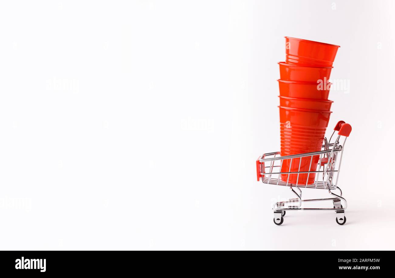 Shopping cart with single use plastic waste isolated on white Stock ...