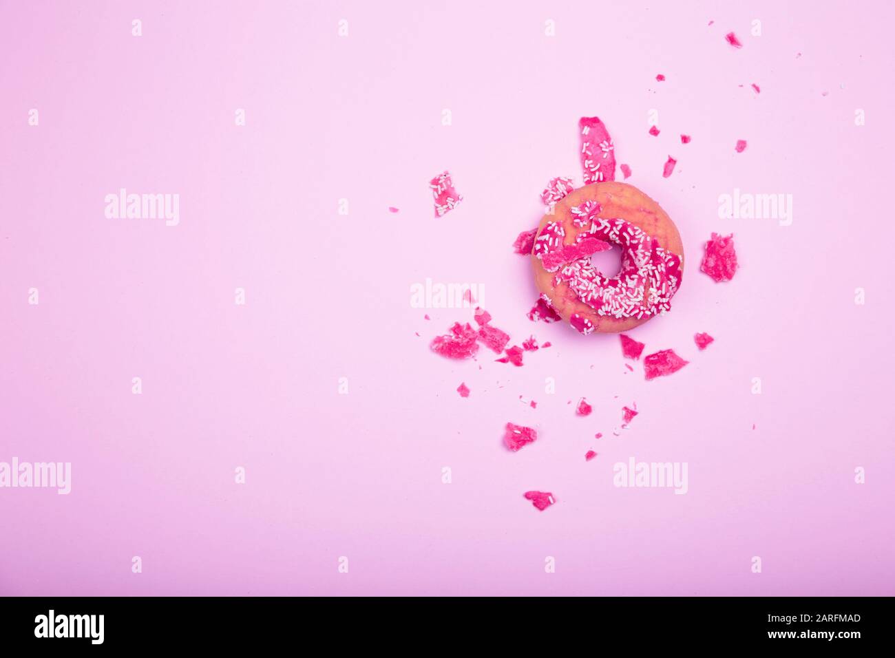 Broken donut on pastel pink background minimal creative concept Stock ...