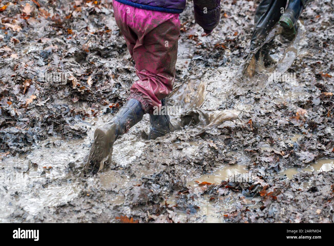 Children boy splash puddle hi-res stock photography and images - Alamy