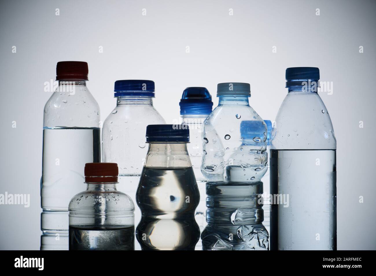 Water bottles and white background Stock Photo - Alamy