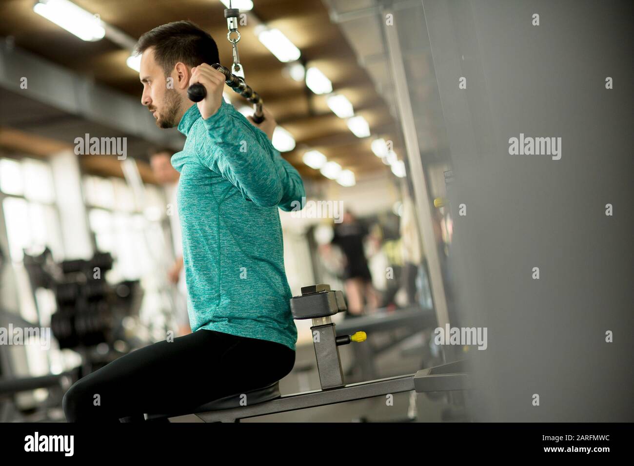 Young handsome man exercise triceps hi-res stock photography and images ...