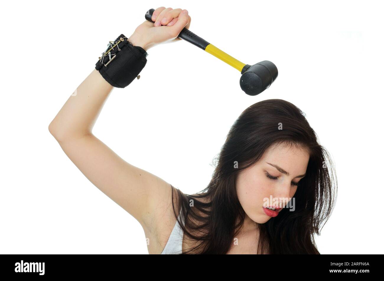 Female model, strong attitude. Young woman from Poland holding hammer ...