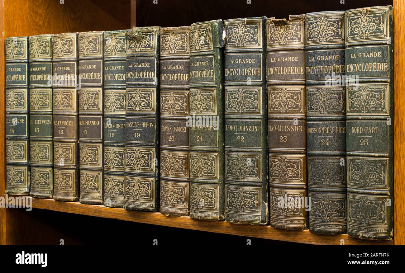 Old books on shelf. French encyclopedia Stock Photo - Alamy