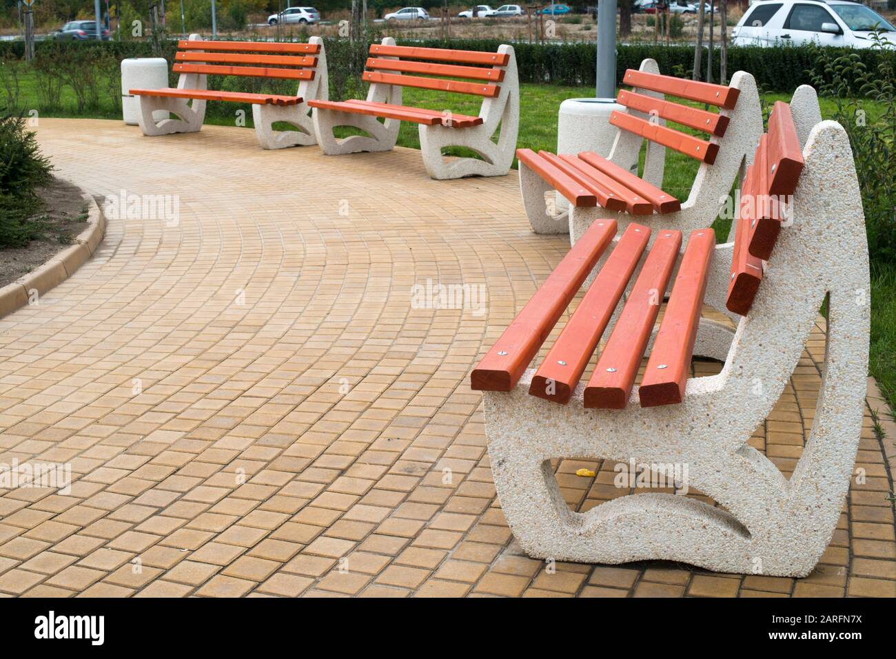 New wooden benches in a park Stock Photo - Alamy