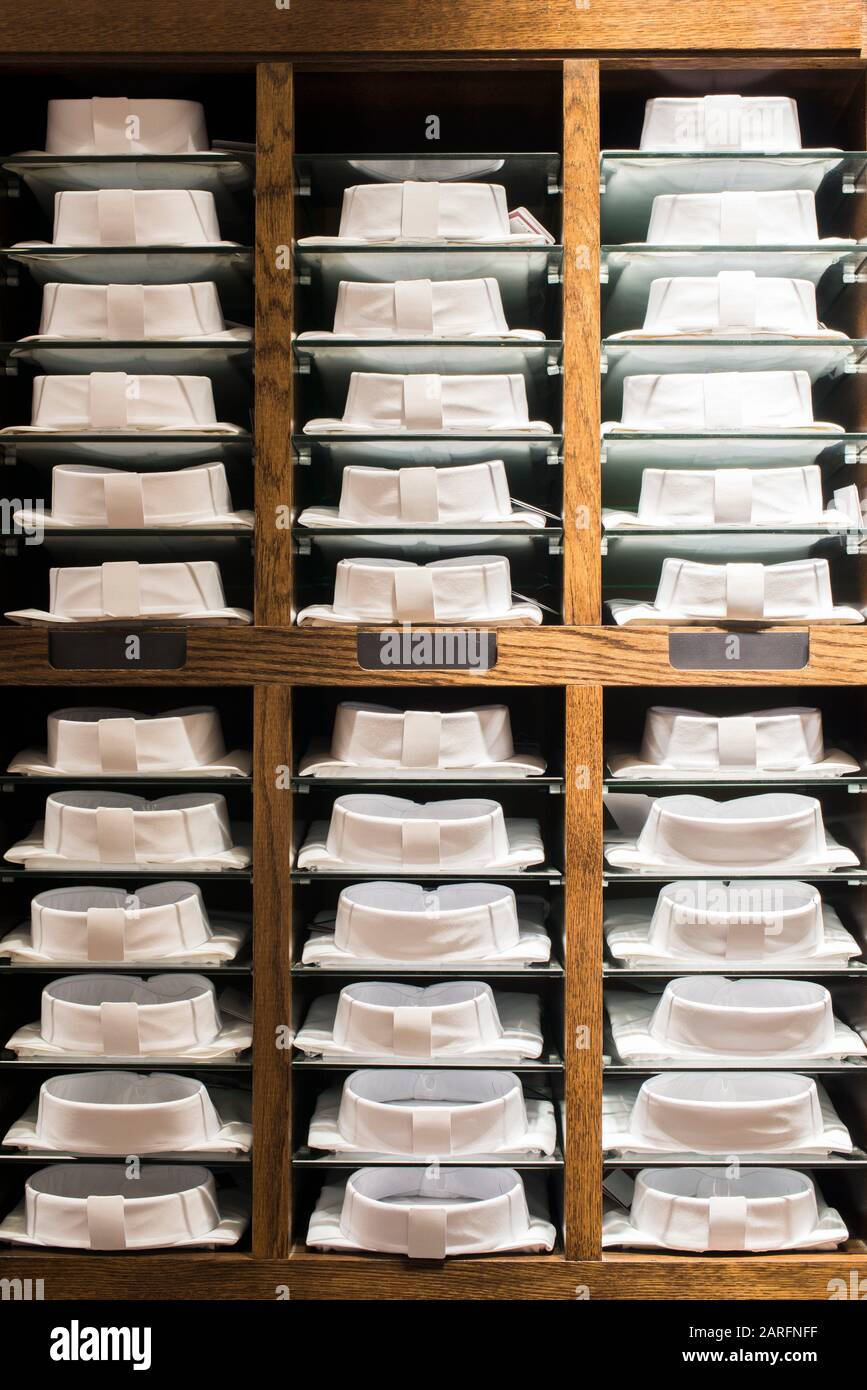 Shirts on a shelf hi-res stock photography and images - Alamy