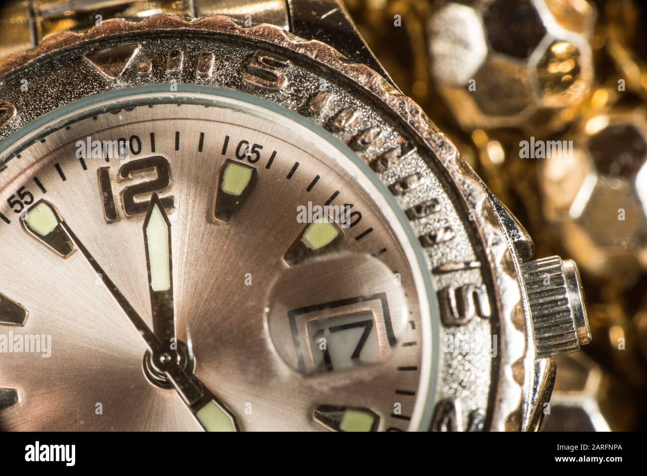Gold color watch hi-res stock photography and images - Alamy
