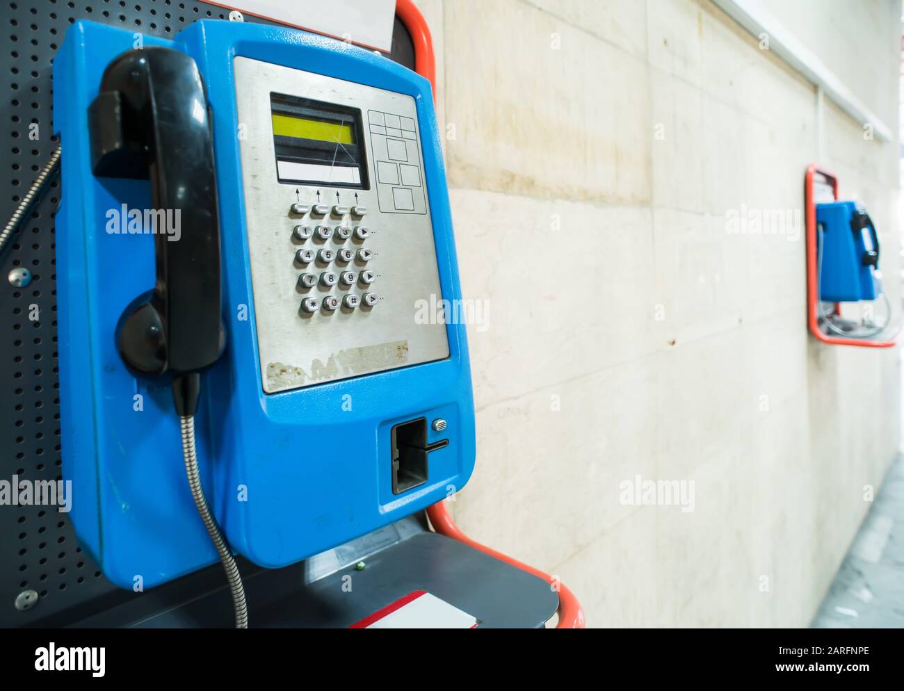 Woman on payphone hi-res stock photography and images - Alamy