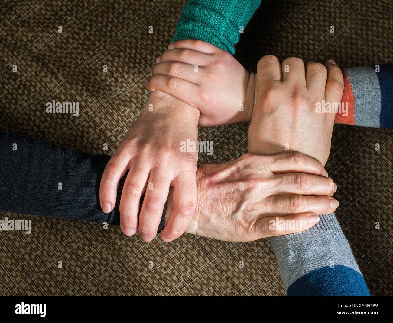 Many hands helping hi-res stock photography and images - Alamy