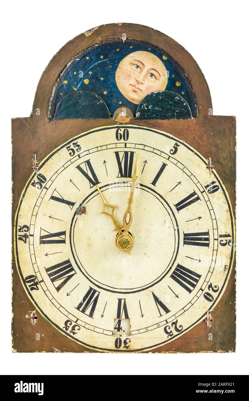 Authentic ancient clock with moon and star rotation isolated on a white ...