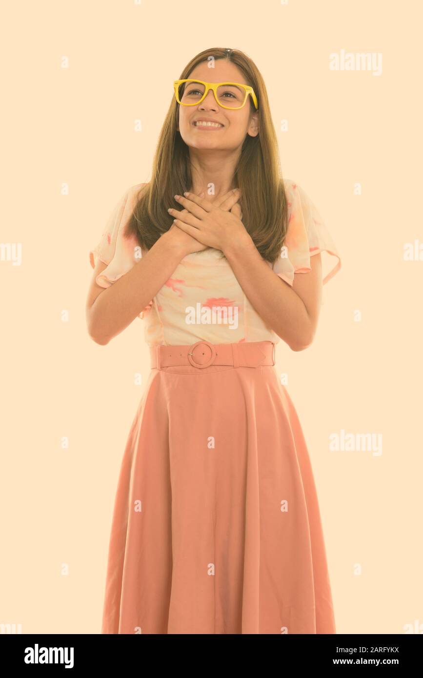 Happy woman with hands to her chest hi-res stock photography and images ...